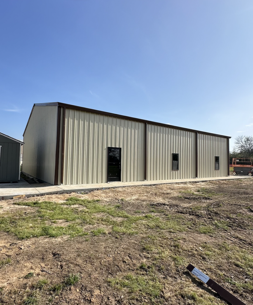 RMB16 – 50×60 Bolt Up Red Iron Steel Building | WolfSteel Buildings